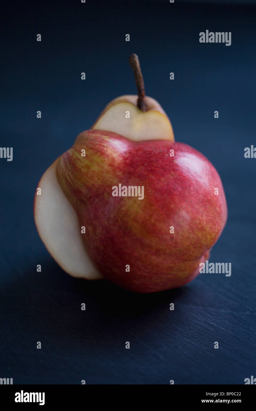 Split red pear Stock Photo - Alamy