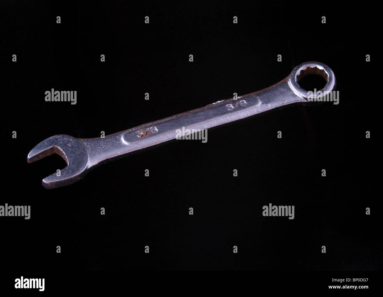 Crome Spanner on a plain black background Stock Photo - Alamy