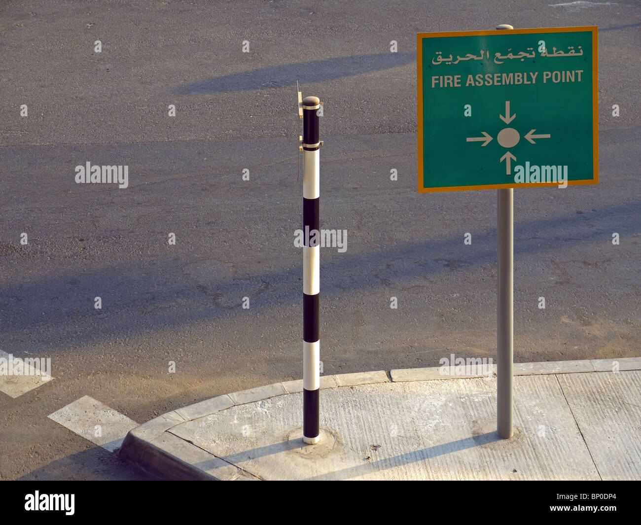'Fire assembly point' sign at the Abu Dhabi international airport, UAE ...