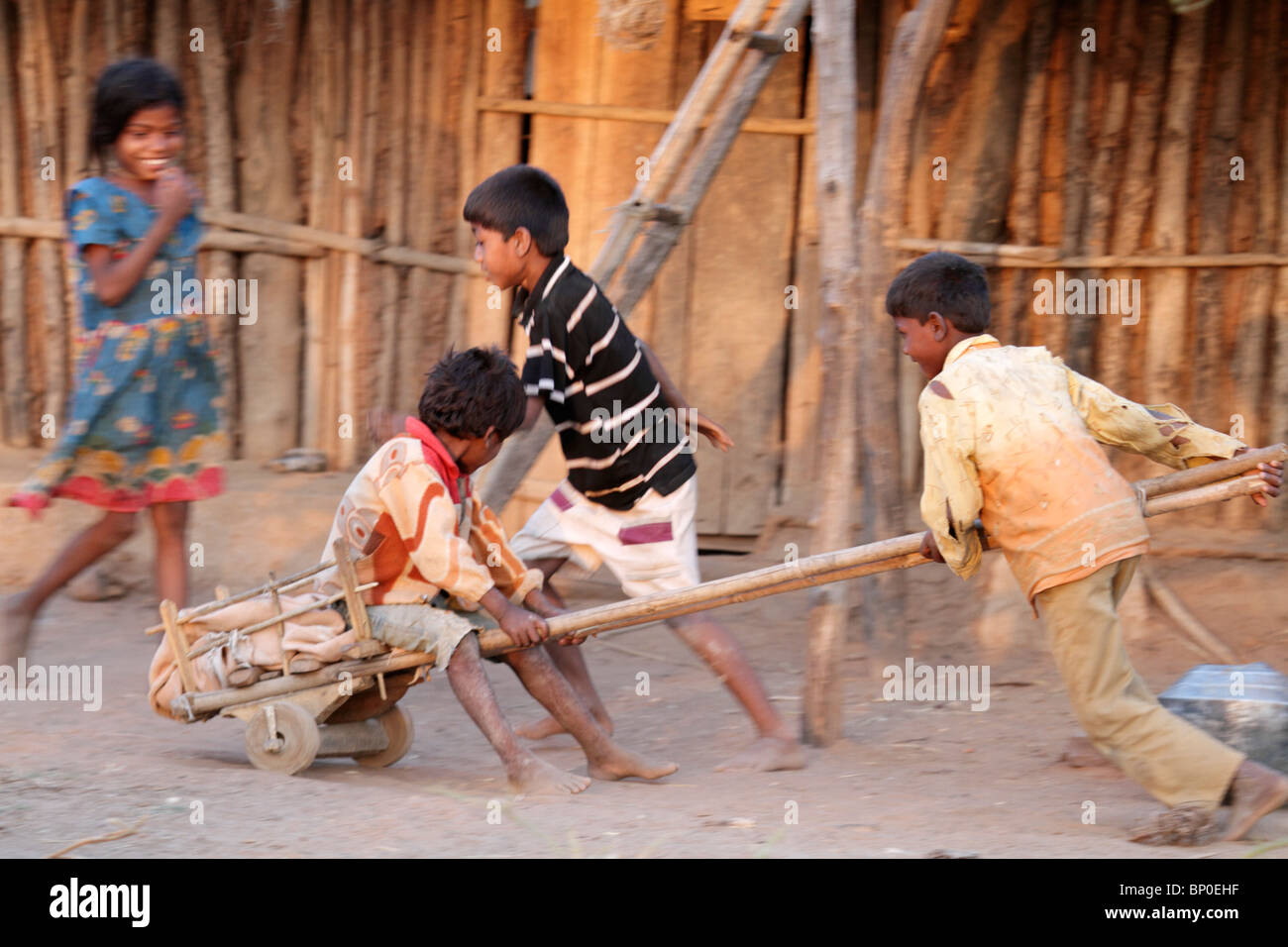 India, Madhya Pradesh. Children playing in rural village near Satpura ...