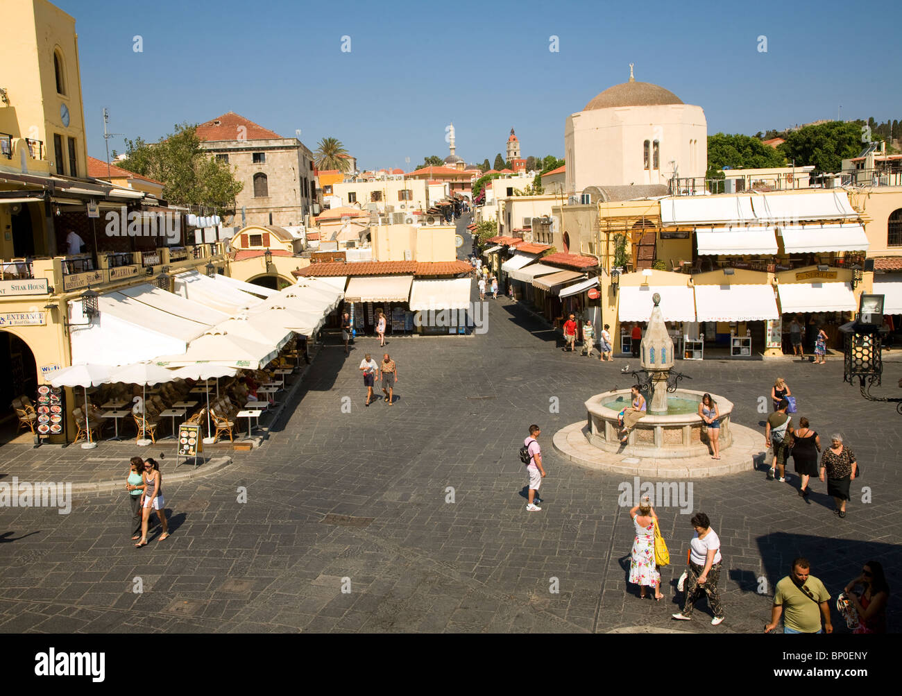 Place Ippokratous square and fountain, Rhodes town, Greece Stock Photo ...