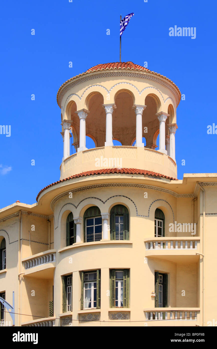 Yellow building part with round construction on top Stock Photo - Alamy