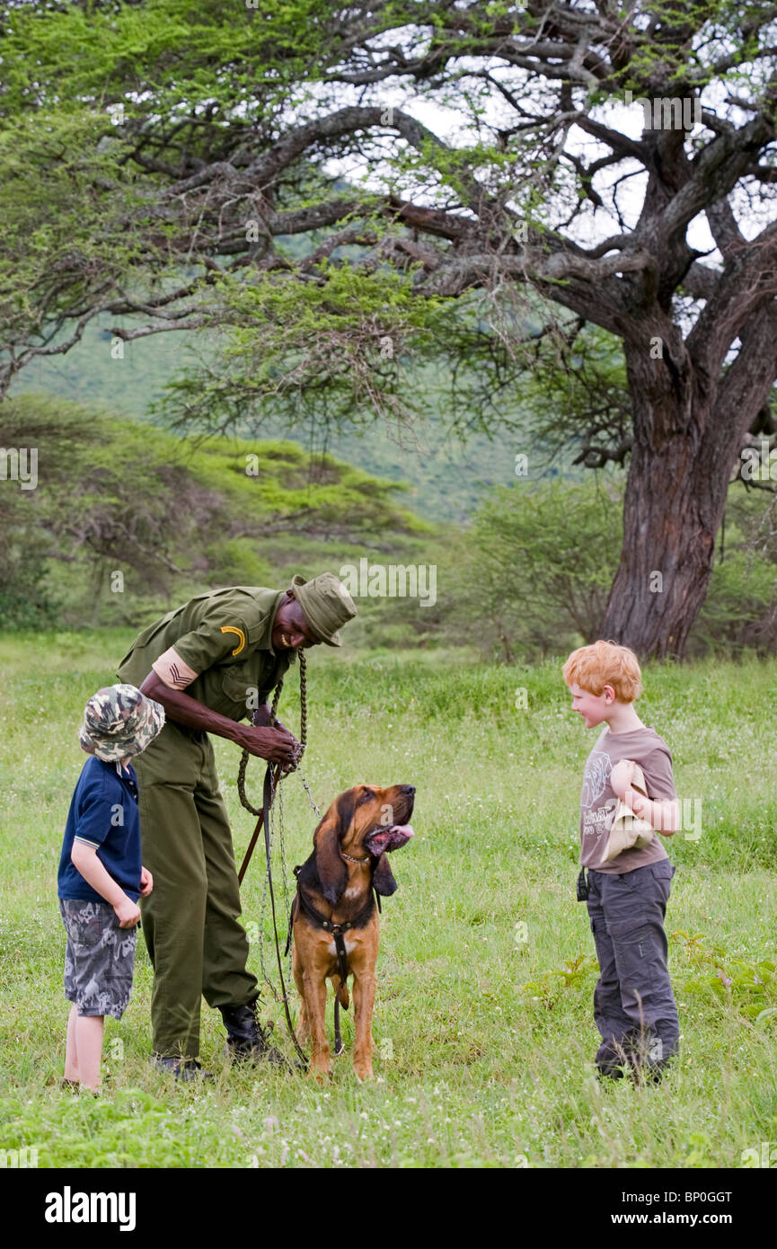 Kenya, Chyulu Hills, Ol Donyo Wuas. Children on a visit to the anti ...