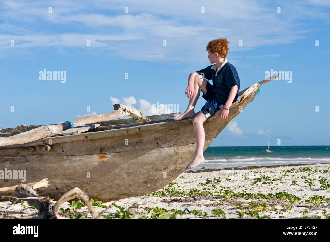 Boys dug out canoe hi-res stock photography and images - Alamy