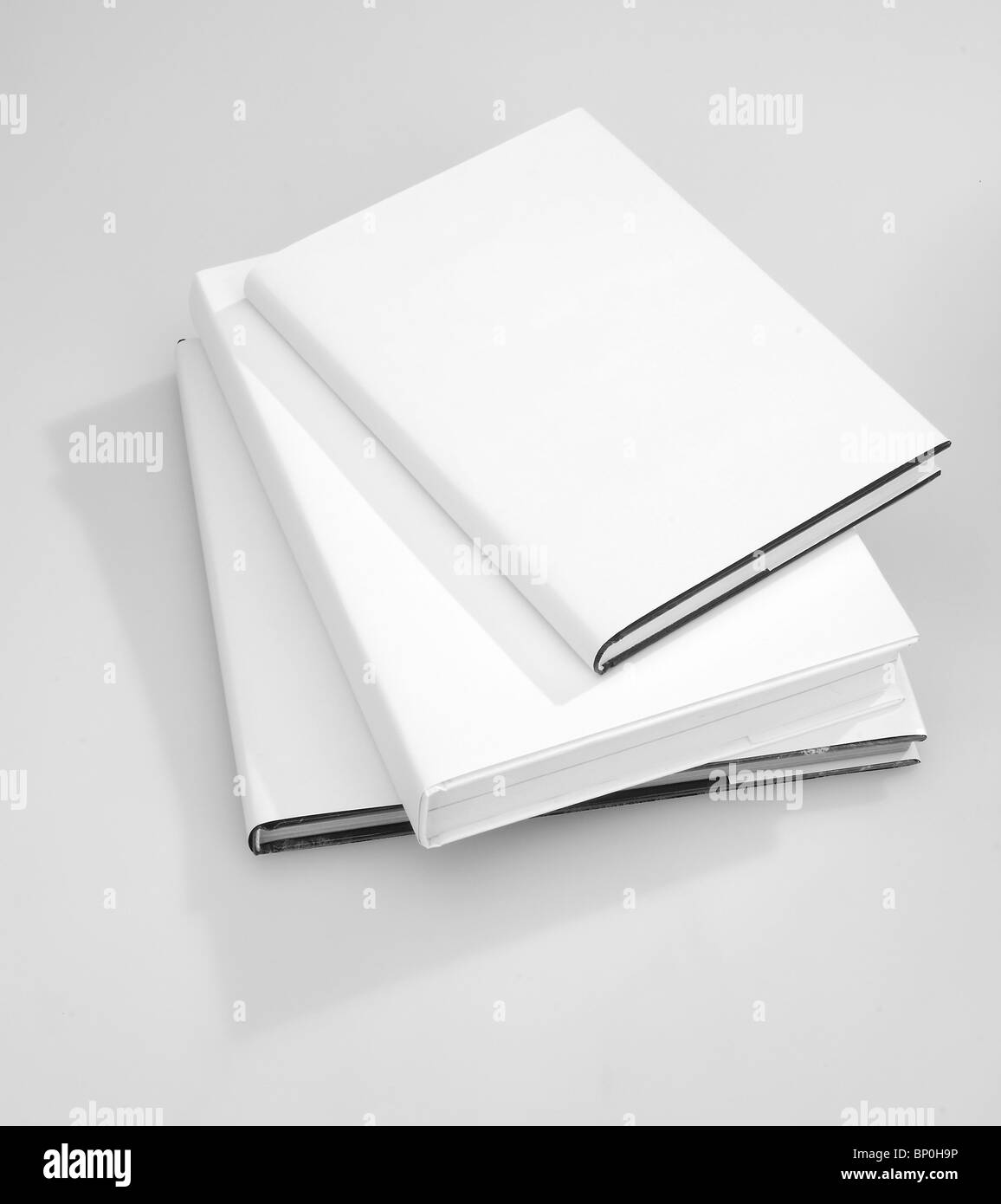 Three Blank book cover white Stock Photo - Alamy