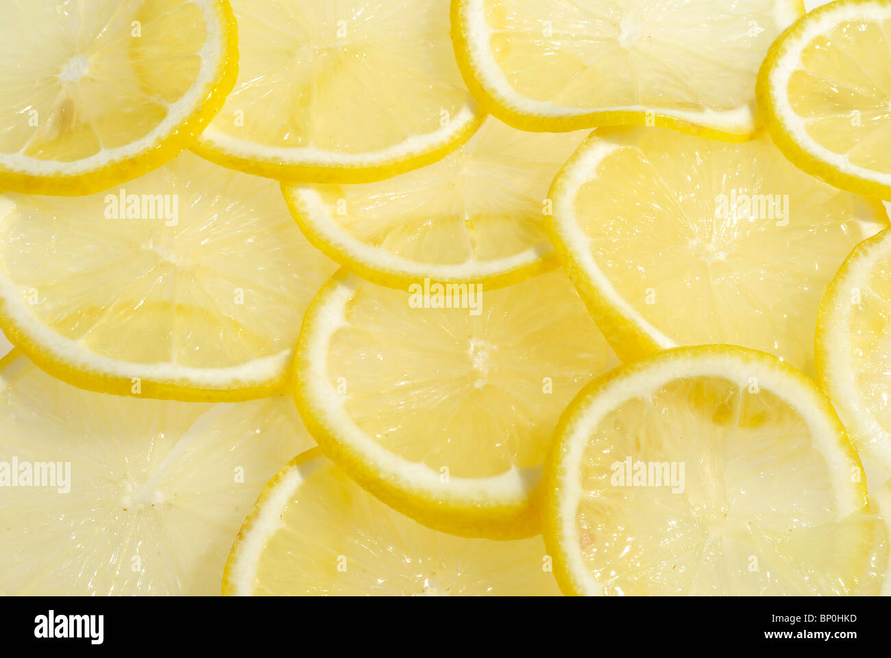 The lemon slices bright texture Stock Photo - Alamy