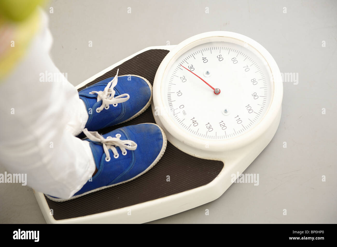 Child feet scales hi-res stock photography and images - Alamy