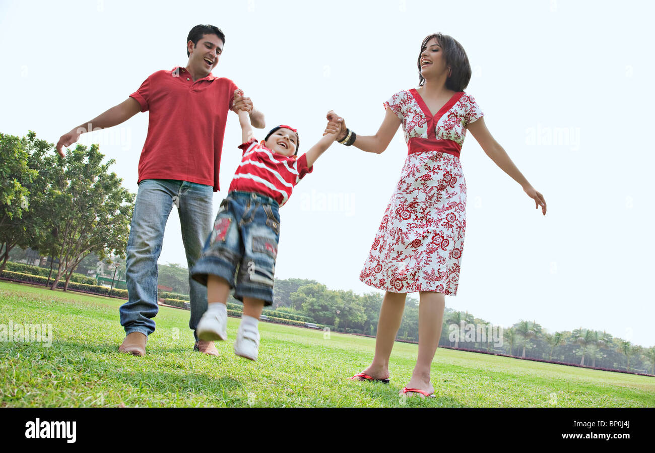 Son having fun with his parents Stock Photo - Alamy