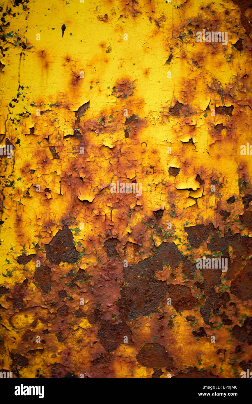 Worn and weathered crusted chipped paint on textured metal Stock Photo ...