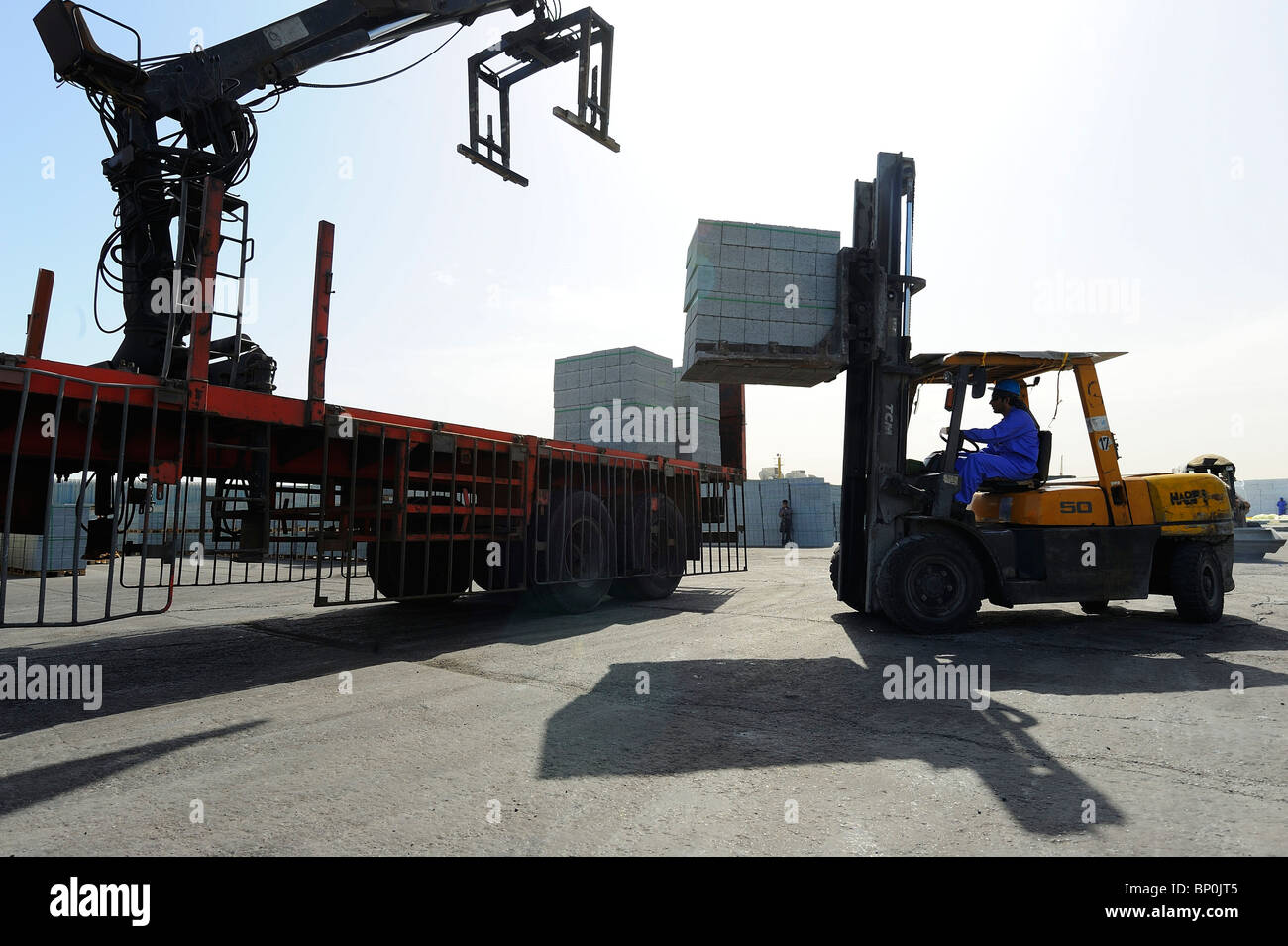 fork lift truck loading Stock Photo - Alamy