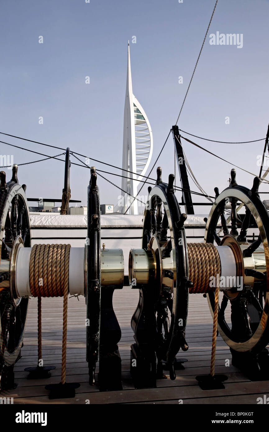 HMS Warrior Ships Wheels with the Spinnaker Tower Stock Photo - Alamy