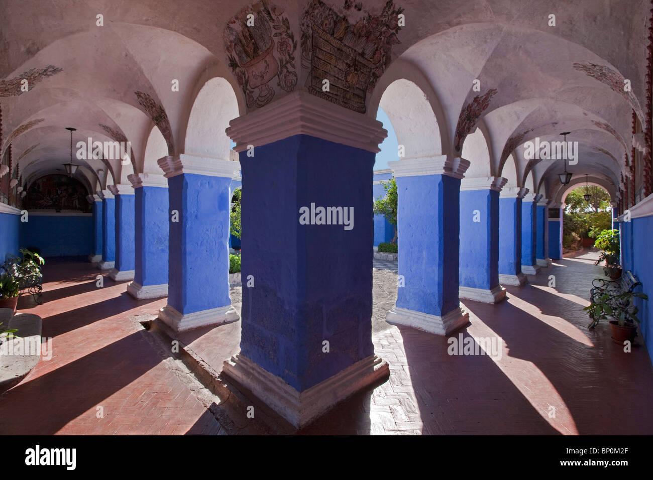 Peru, Vaulted walkways around a courtyard garden in the magnificent ...
