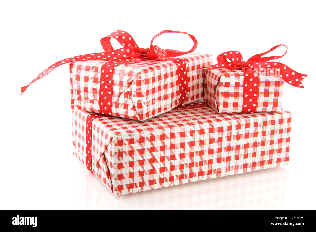 Red and white presents Stock Photo - Alamy