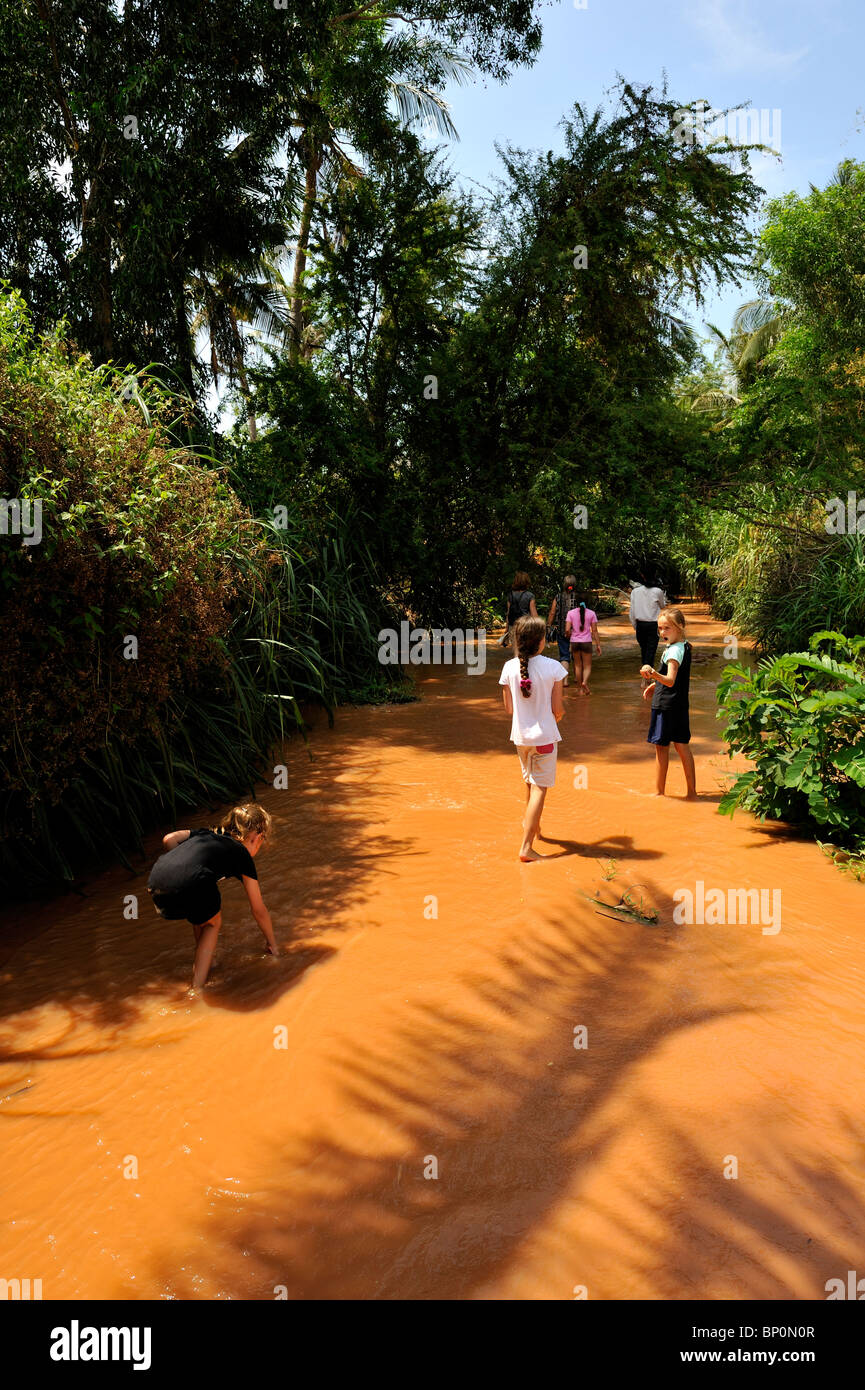 Children walking along the Fairy Stream (Suoi Tien), Mui Ne, Vietnam ...