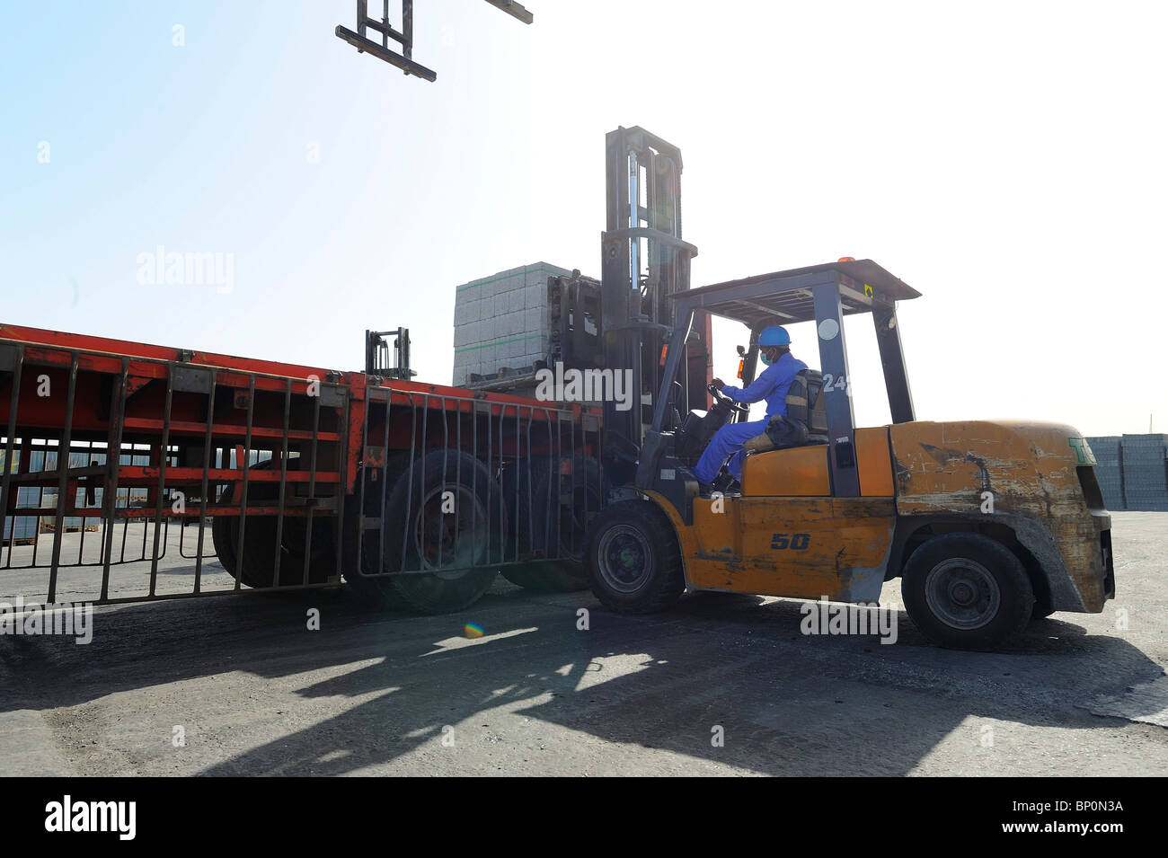 fork lift truck loading Stock Photo - Alamy