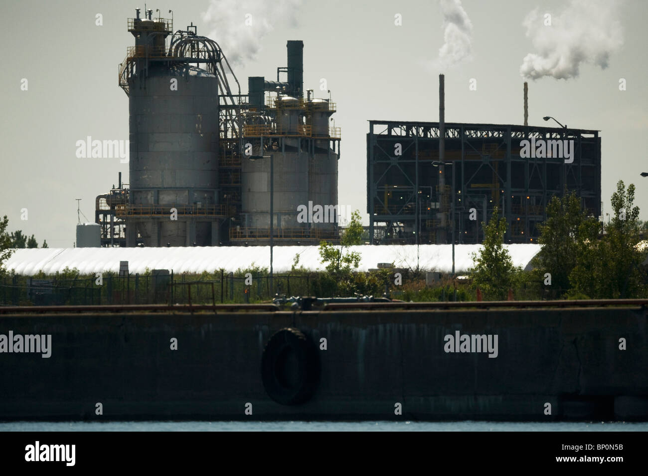 Canada, Quebec, Monteregie, factory on Saint Lawrence River Stock Photo ...