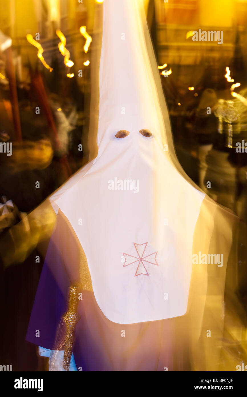 Penitents wearing hooded robes during Semana Santa, (Holy Week ...