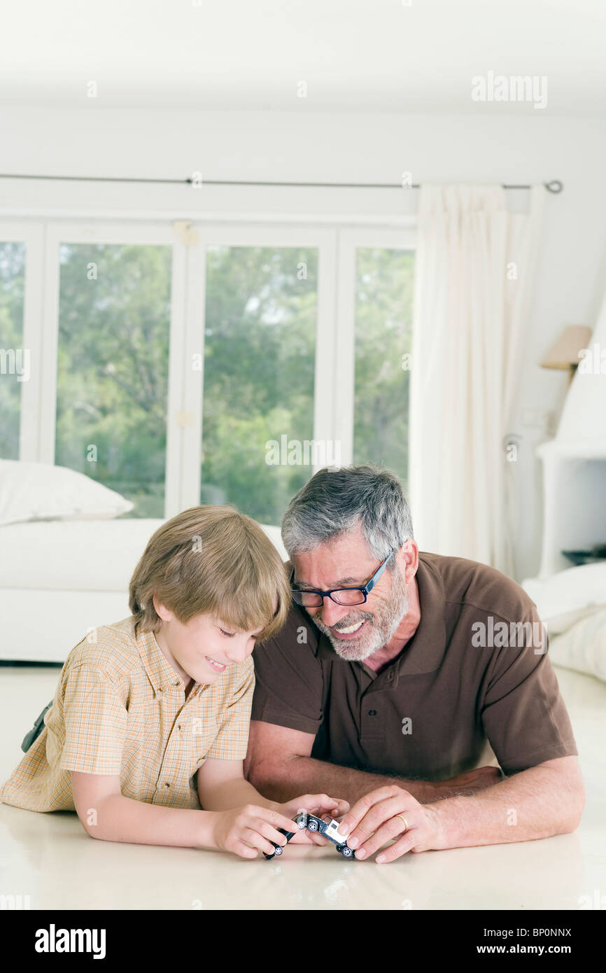 Man and child playing together Stock Photo - Alamy