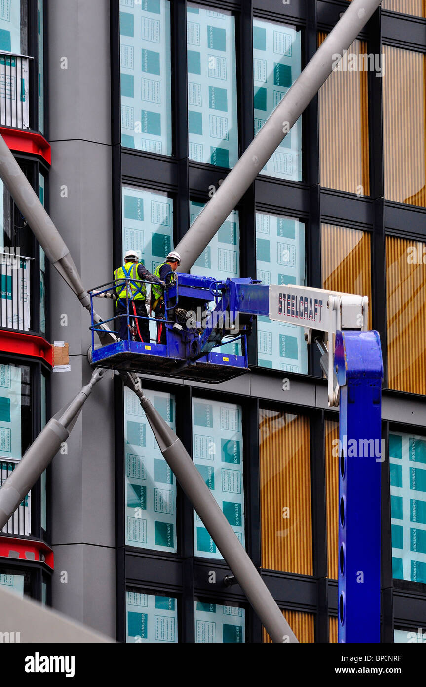 Workers cradle hi-res stock photography and images - Alamy