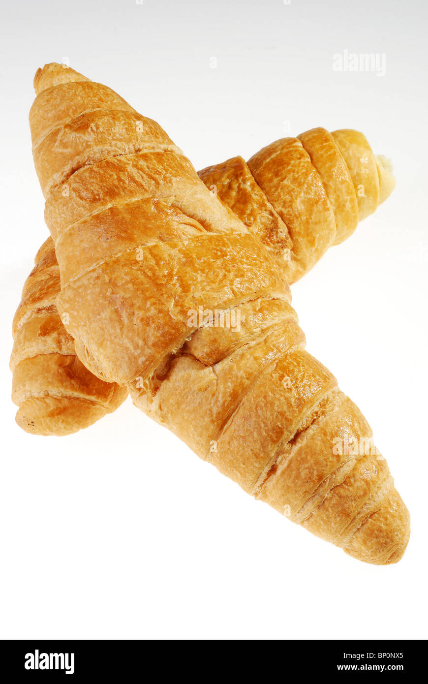 Two Croissants on white background Stock Photo - Alamy