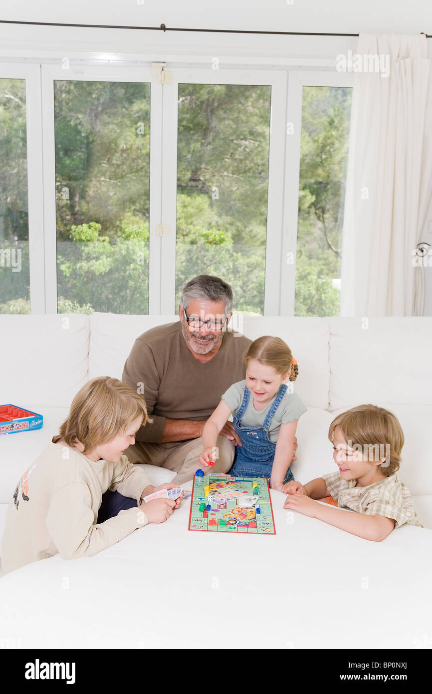 Children playing monopoly hi-res stock photography and images - Alamy