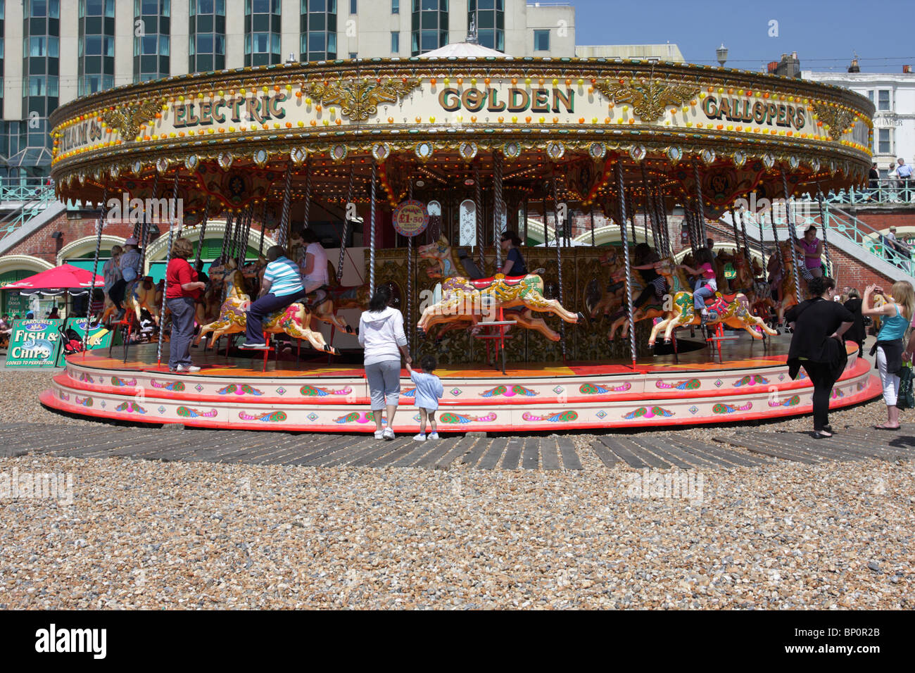 Electric Golden Gallopers merry-go-round on Brighton Beach, Sussex ...