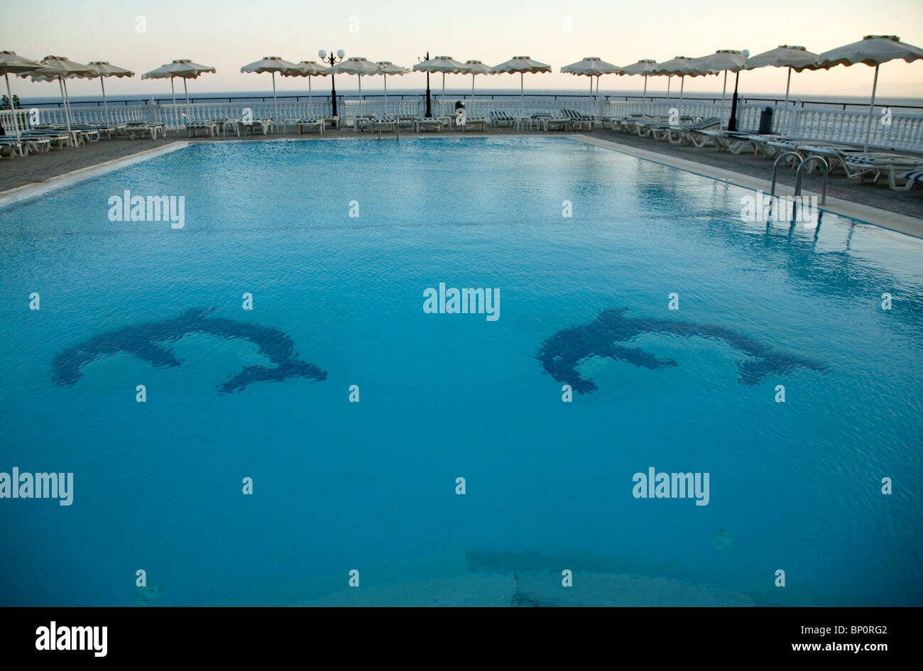 Empty swimming pool by sea at dusk hi-res stock photography and images ...