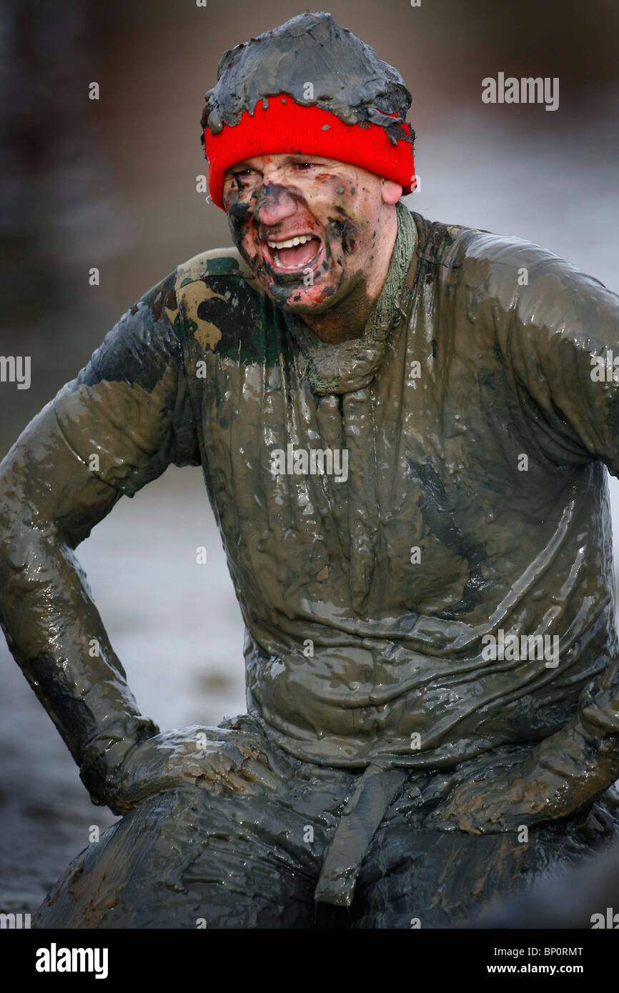 A competitor struggles to get to the finish line during the Maldon Mud ...