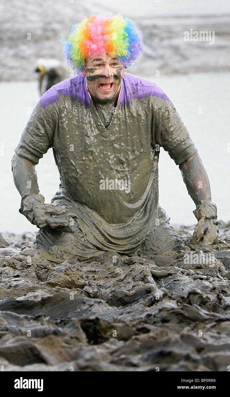 A competitor struggles to get to the finish line during the Maldon Mud ...