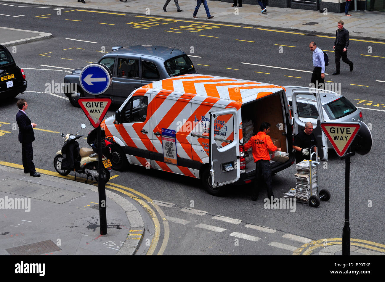Evening Standard Delivery Van unloading Stock Photo - Alamy