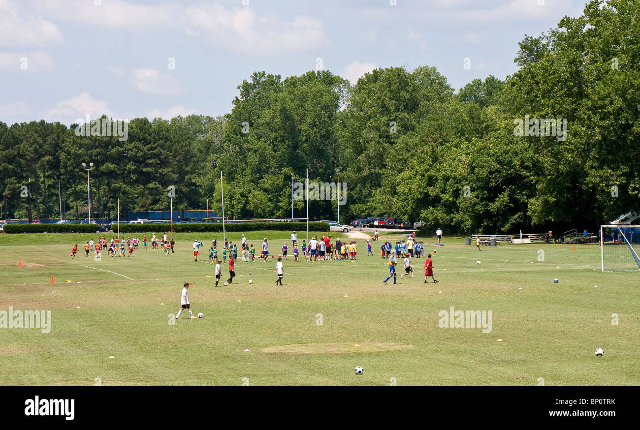 A soccer field full of kids playing Stock Photo - Alamy