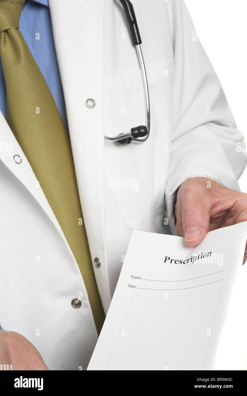 Doctor holding prescription Stock Photo - Alamy