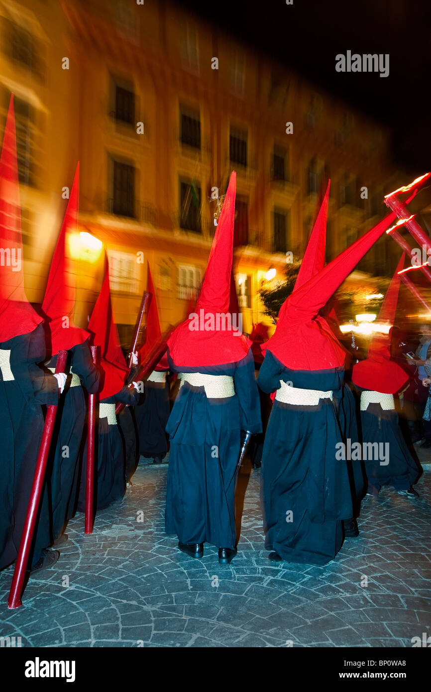 Penitents wearing hooded robes during Semana Santa, (Holy Week ...