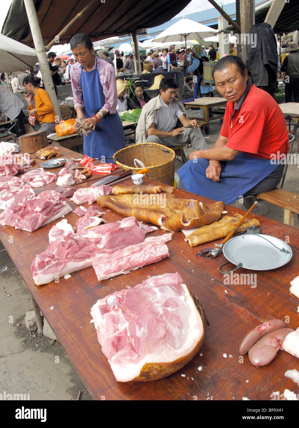 China, Yunnan province, Xizhou, market, butcher's stall Stock Photo - Alamy