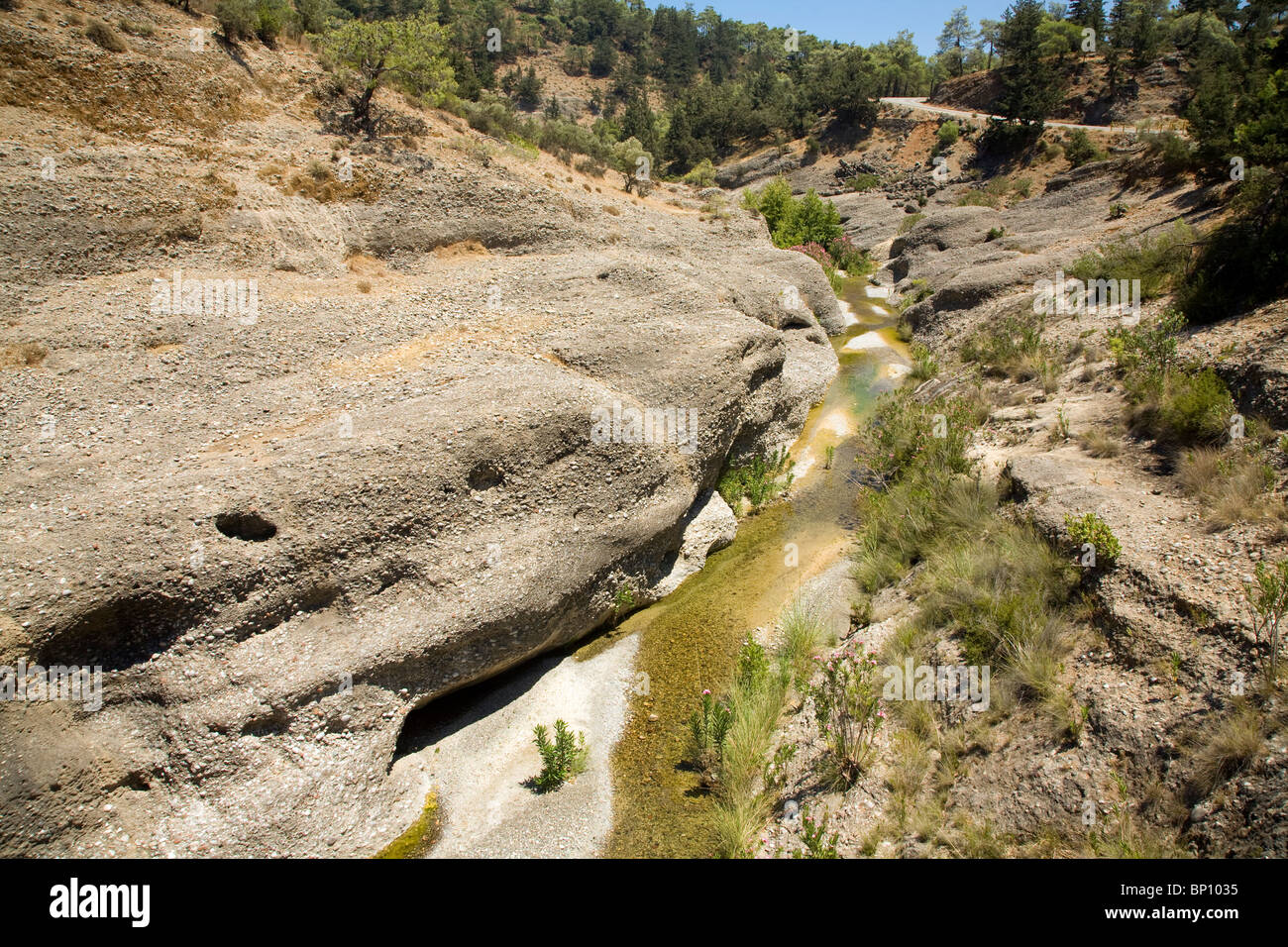 River vertical erosion through conglomerate rock beds, Rhodes, Greece ...