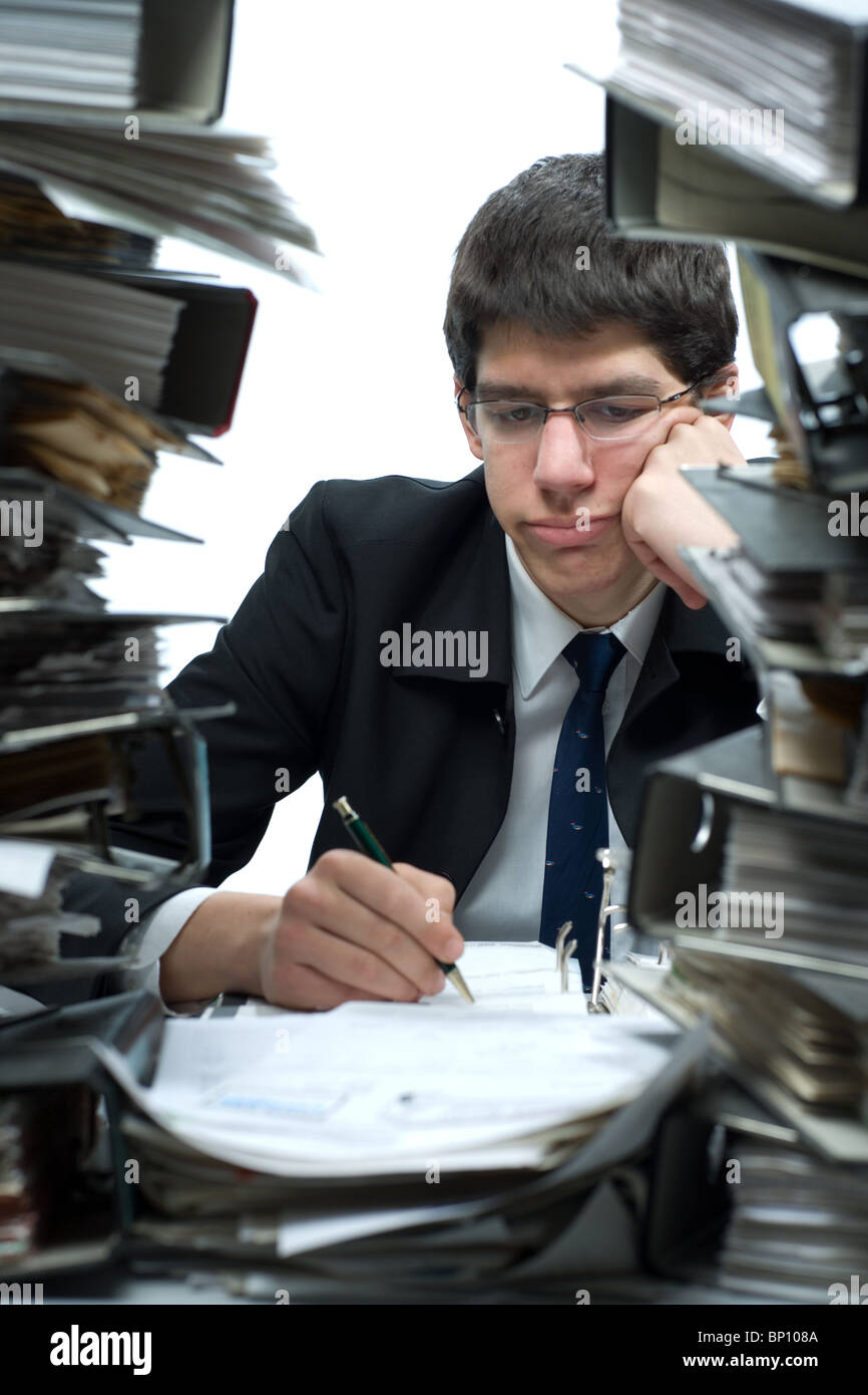 Desperate bookkeeper at work Stock Photo - Alamy