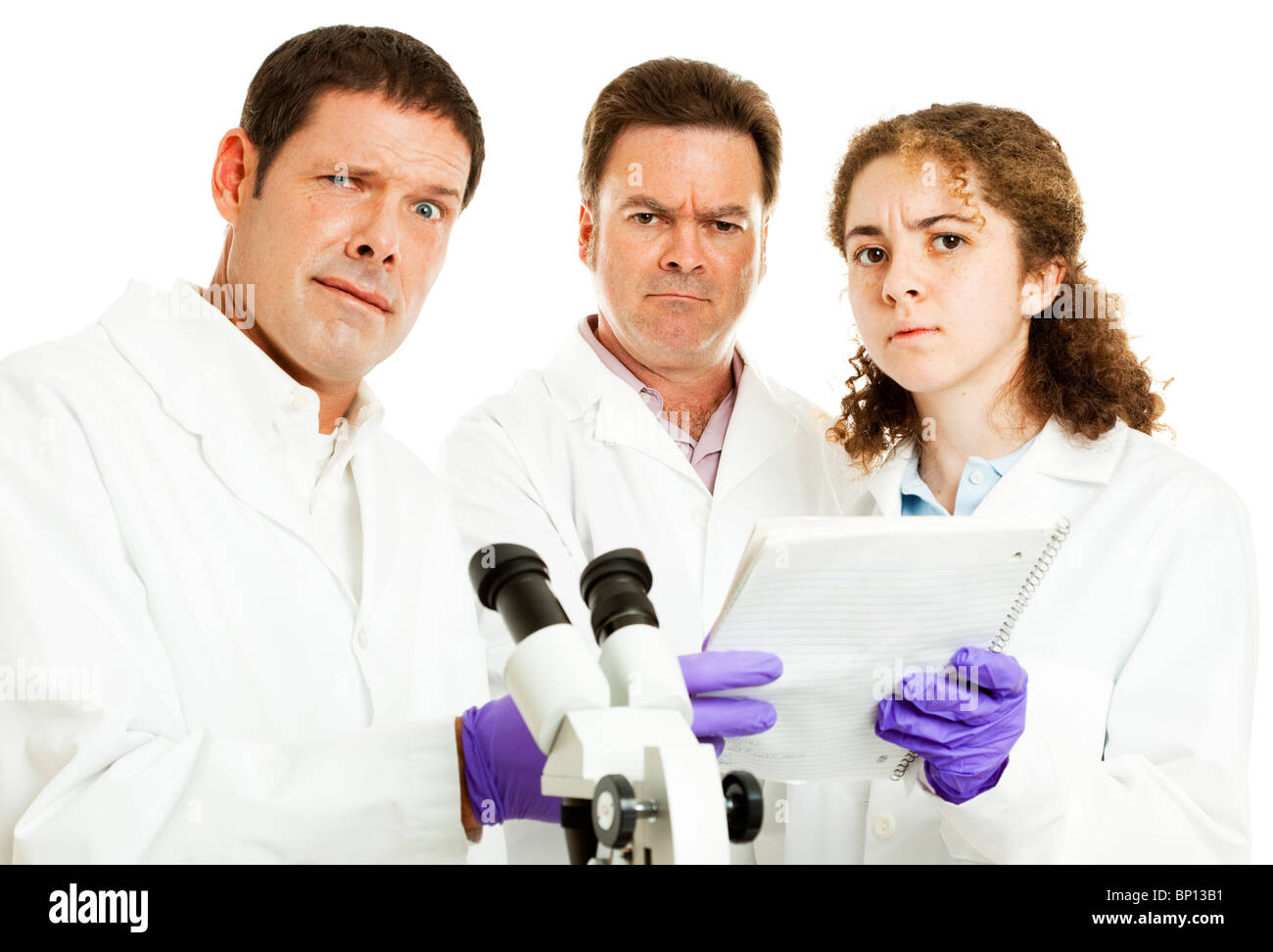 Perplexed, confused scientists looking at lab results. White background ...