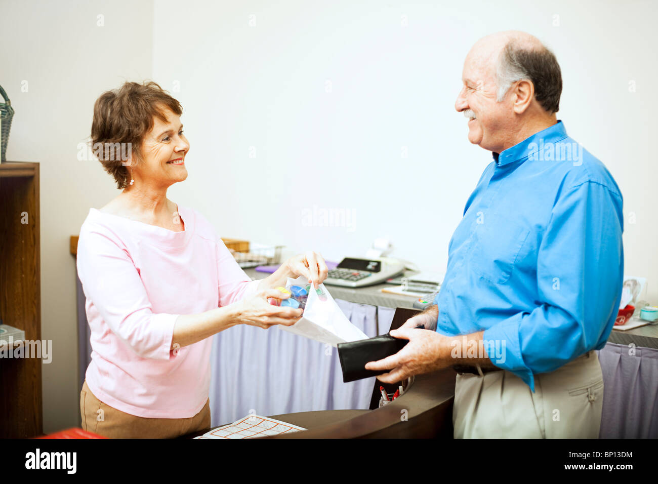 Bookstore clerk hi-res stock photography and images - Alamy
