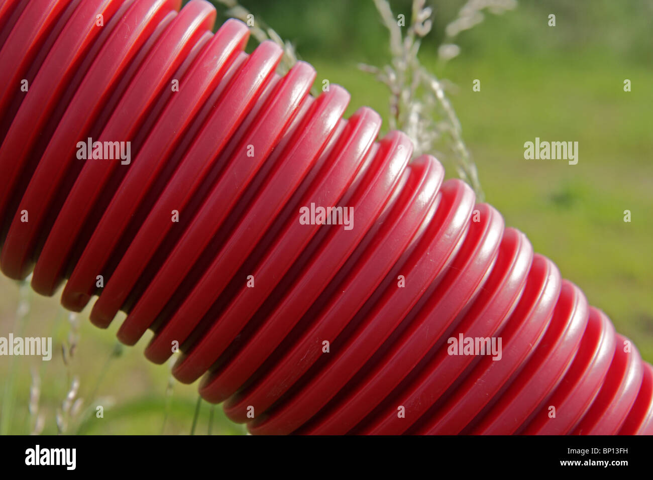 Red drainage pipe Stock Photo - Alamy