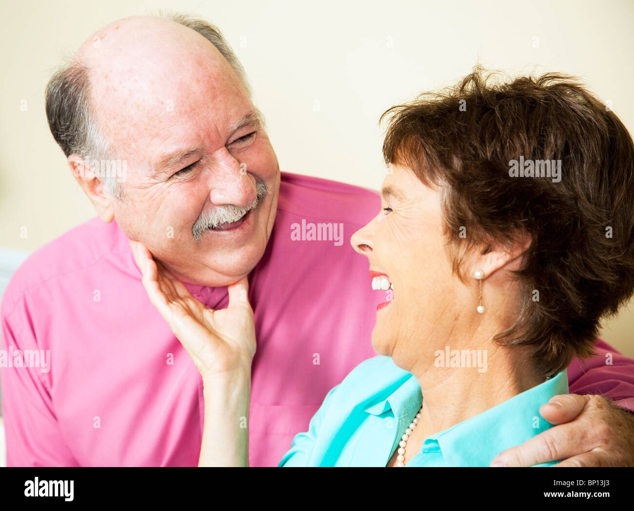 Senior couple laughing together cut hi-res stock photography and images ...