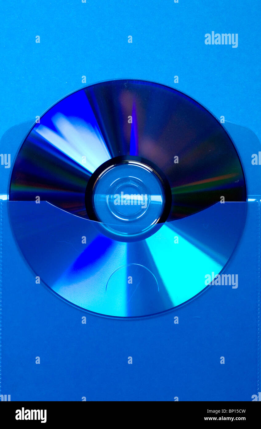 Blue dvd in blue plastic cover on blue background Stock Photo - Alamy