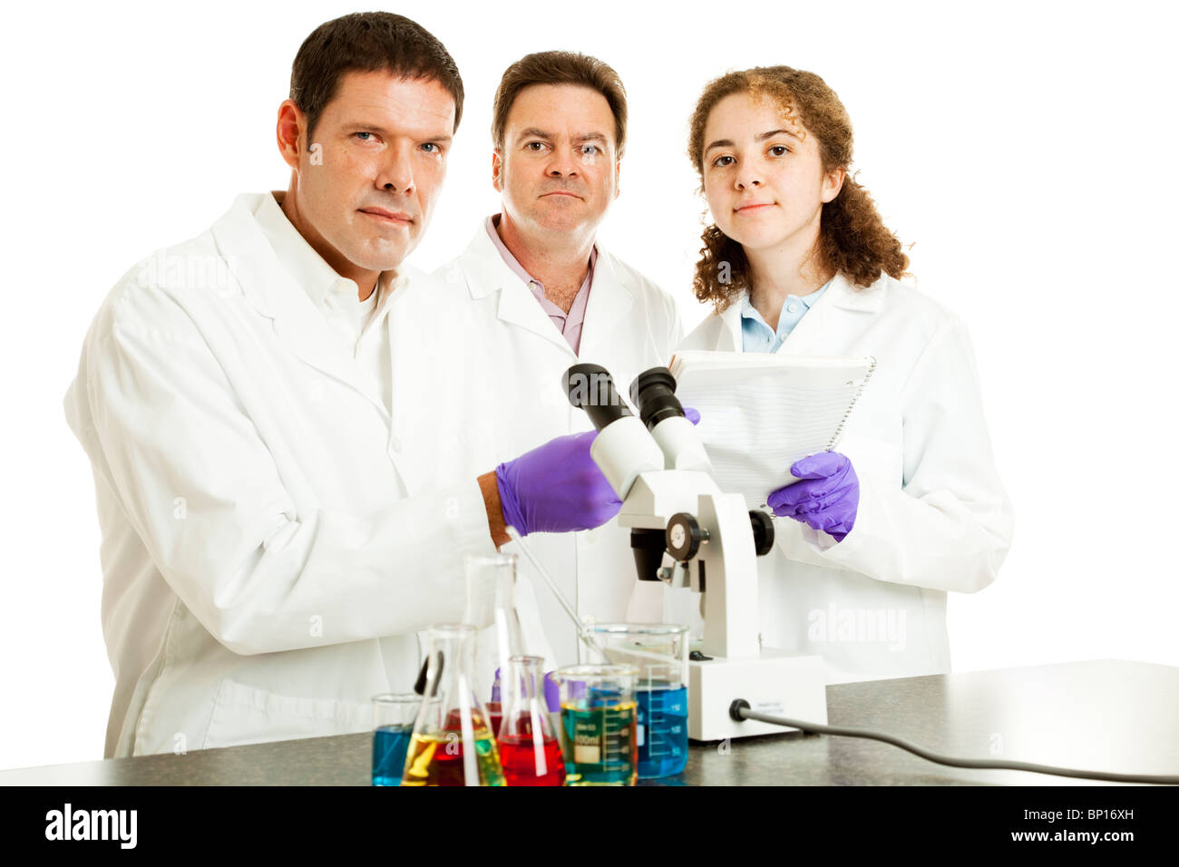 Group of serious scientists in the laboratory. Isolated on white Stock ...