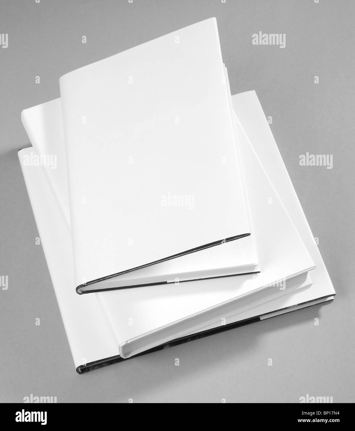Three Blank book cover white Stock Photo - Alamy