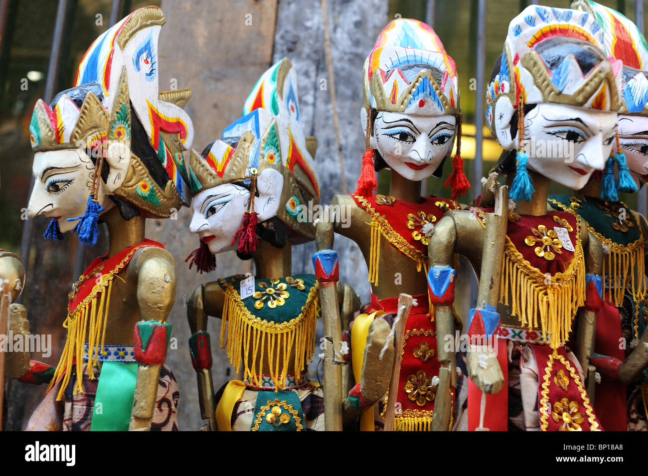 Decorated Indonesian Java puppets. Camden Market, London Stock Photo ...