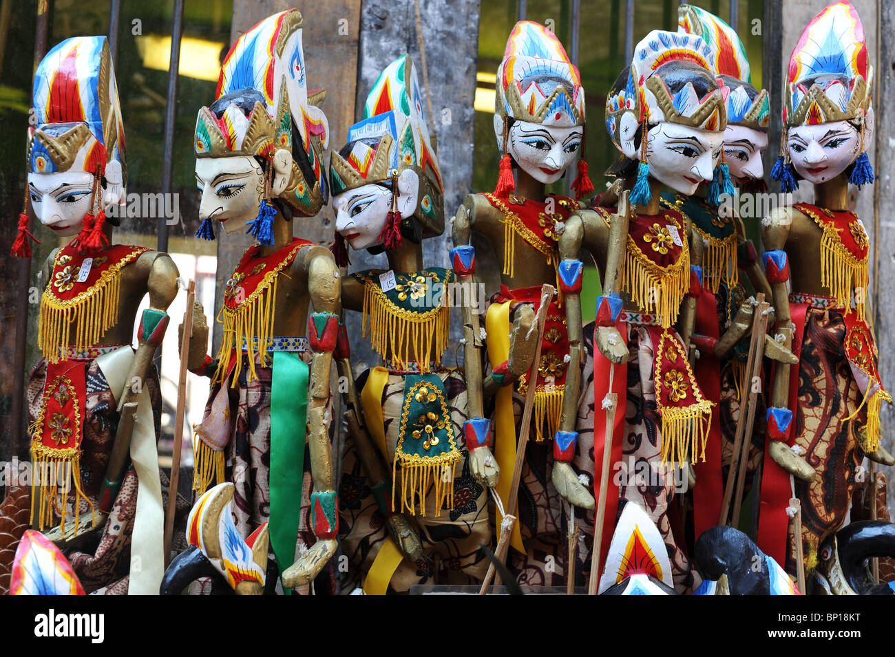 Decorated Indonesian Java puppets. Camden Market, London Stock Photo ...