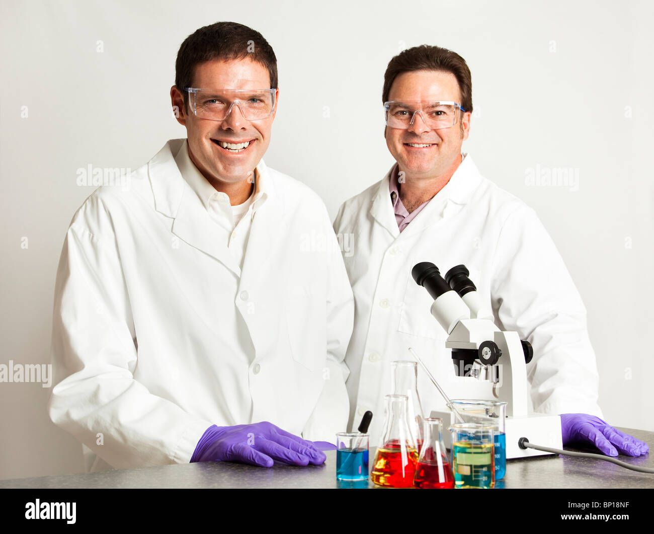 Happy, smiling scientific colleagues in the laboratory Stock Photo - Alamy