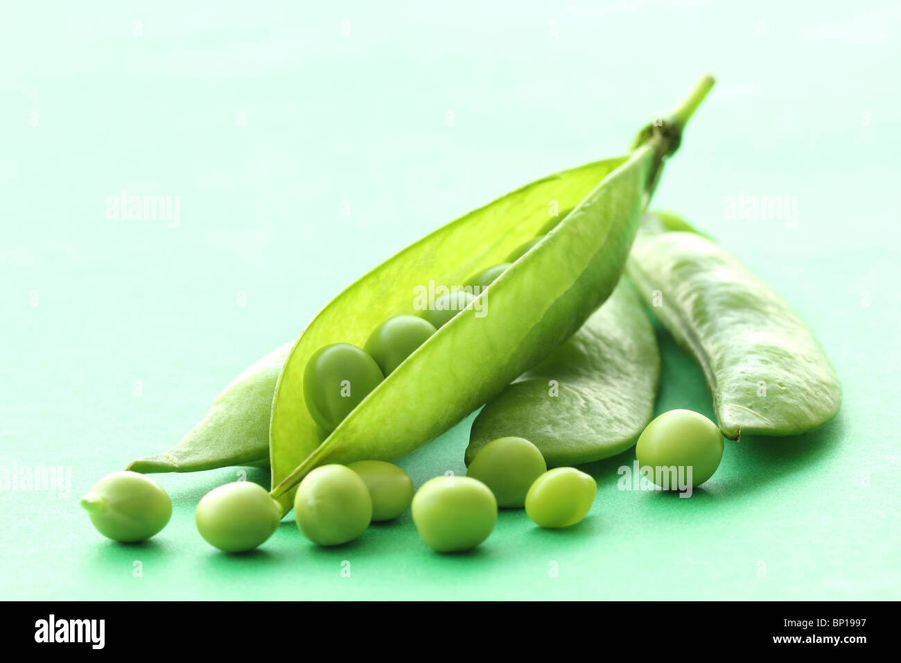 Close-up photograph of green peas and pea pods purchased at a local ...