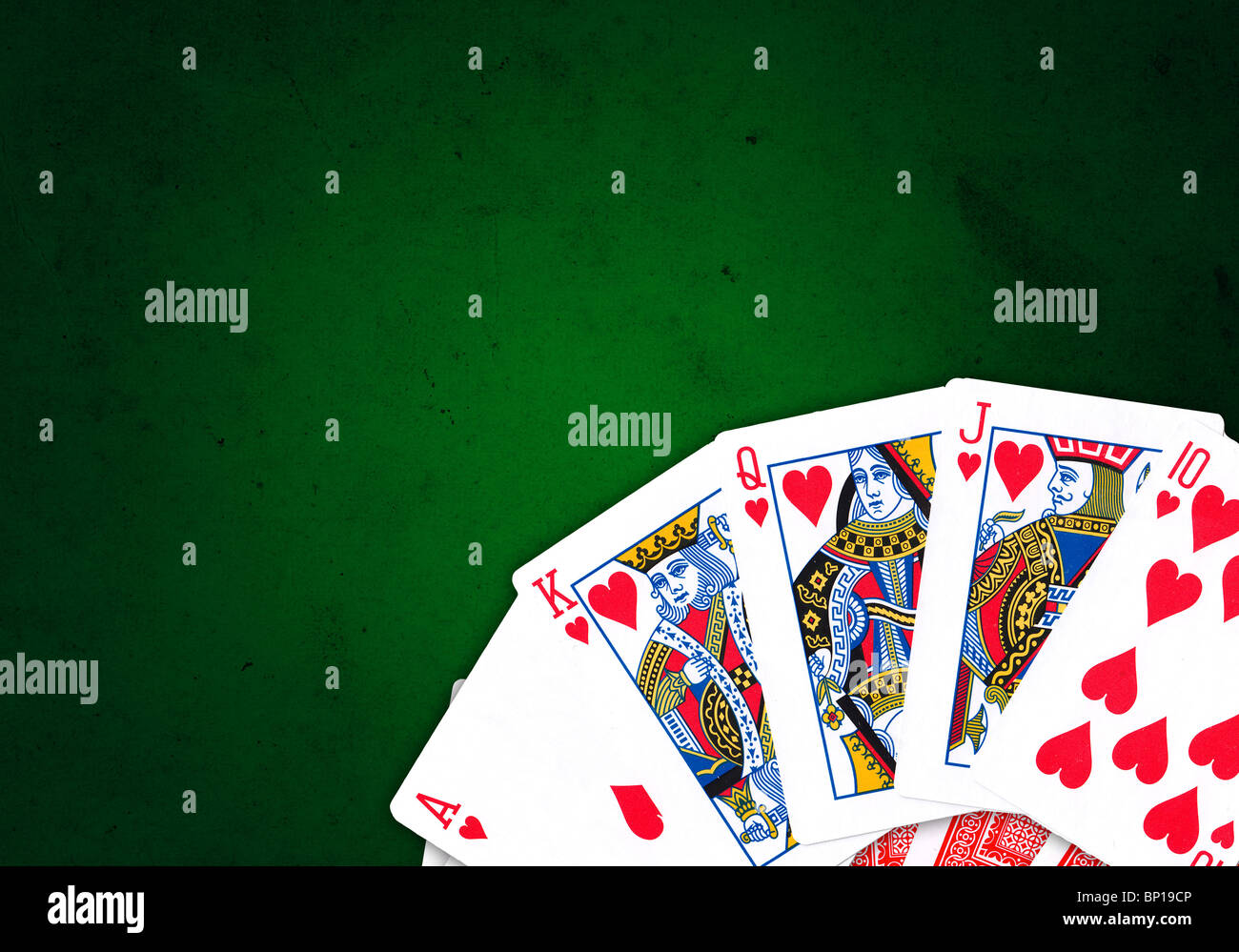 Royal Flush of Spades over a green grungy background Stock Photo - Alamy
