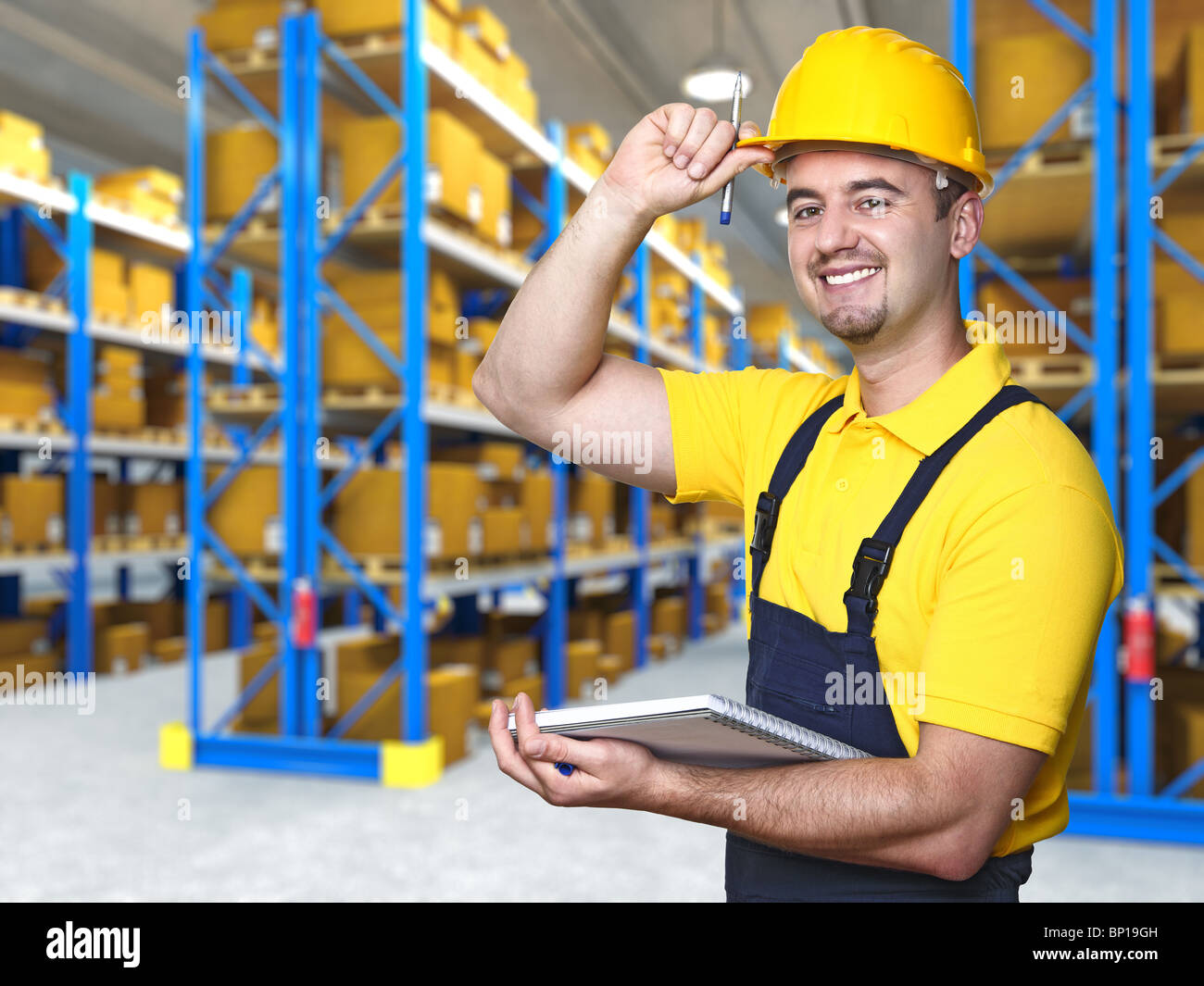 smiling manual worker isolated warehouse 3d background Stock Photo - Alamy