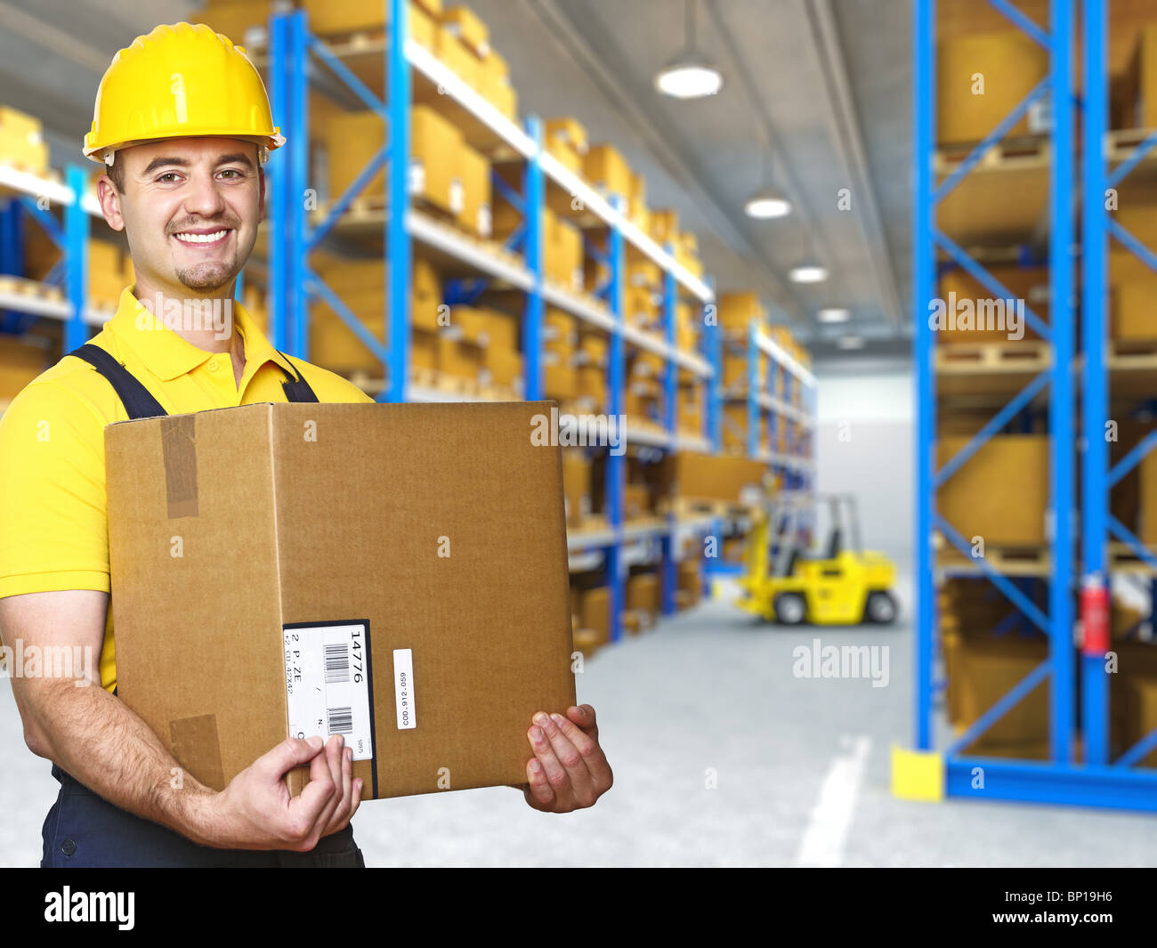 manual worker with parcel and warehouse parcel Stock Photo - Alamy